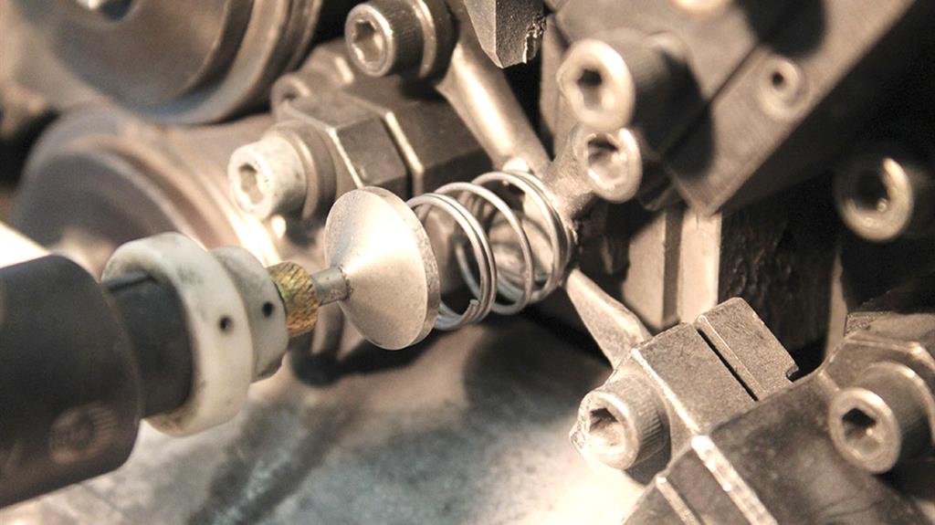 Electronic grinders for springs